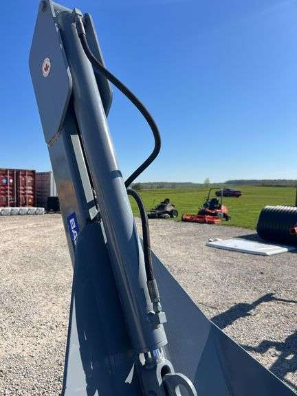 BAUMAN SS330 SKID STEER MOUNT 30" TREE SPADE - Shackelton Auctions Inc.