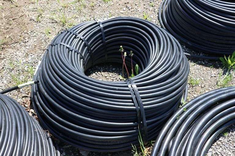 1000' ROLL OF 1/2" POLY HOSE - Shackelton Auctions Inc.
