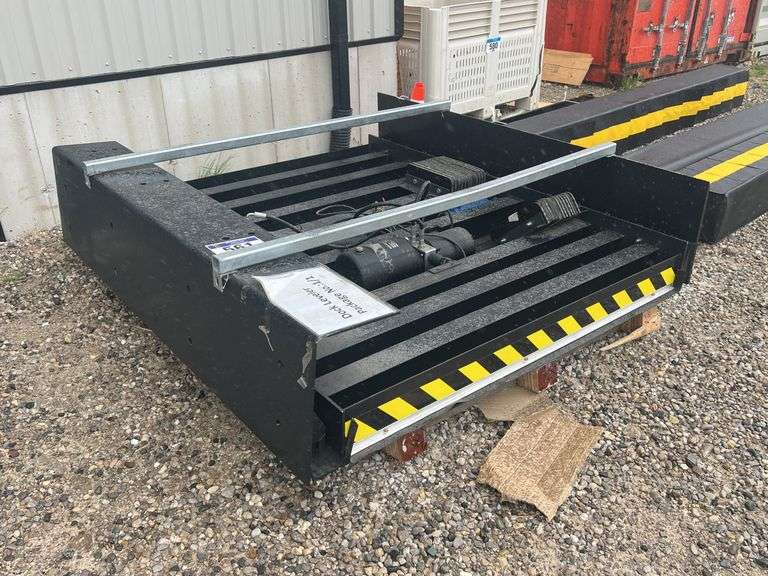 NEW 10 TON LOADING DOCK WITH BUMPER CUSHIONS - Shackelton Auctions Inc.