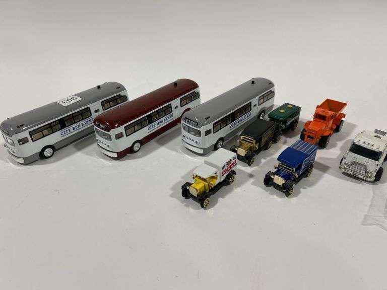 DIE CAST 1/64 SCALE BUSES AND VEHICLES - Shackelton Auctions Inc.