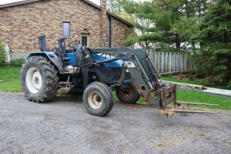 NEW HOLLAND TL90 TRACTOR & LOADER - Shackelton Auctions Inc.