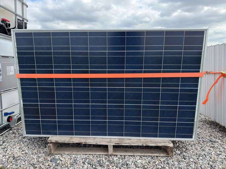 SKID OF 21 SHARP 235 WATT SOLAR PANELS - Shackelton Auctions Inc.