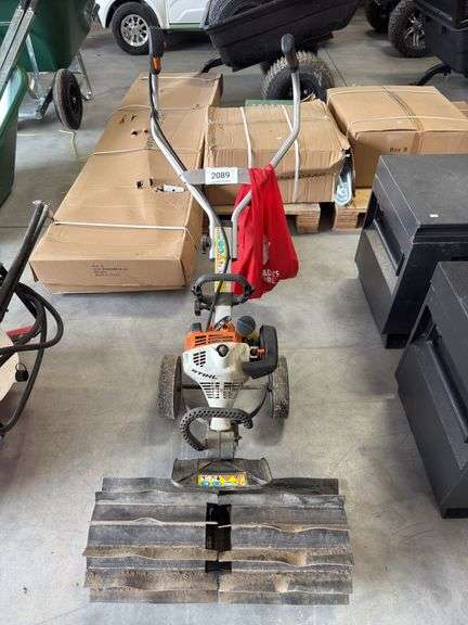STIHL MM55 PADDLE SWEEPER - Shackelton Auctions Inc.