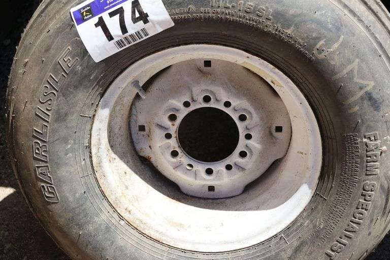 11L-15 NEW TIRE & RIM - Shackelton Auctions Inc.