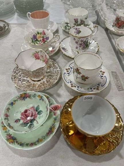 EIGHT TEA CUPS AND SAUCERS - Shackelton Auctions Inc.