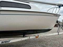 SIREN 17' SAILBOAT WITH EZ LOADER TRAILER - Shackelton Auctions Inc.