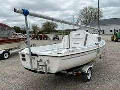 SIREN 17' SAILBOAT WITH EZ LOADER TRAILER - Shackelton Auctions Inc.
