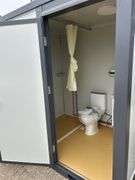 BASTONE PORTABLE RESTROOM WITH SHOWERS - SMALL - Shackelton Auctions Inc.