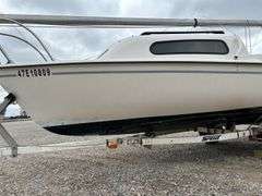 SIREN 17' SAILBOAT WITH EZ LOADER TRAILER - Shackelton Auctions Inc.