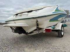 SEA RAYDER F16 JET BOAT & TRALER - Shackelton Auctions Inc.