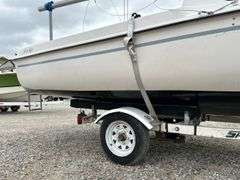 SIREN 17' SAILBOAT WITH EZ LOADER TRAILER - Shackelton Auctions Inc.