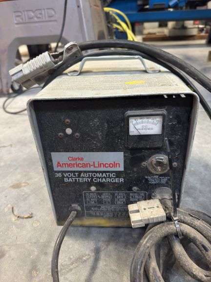 NILFISK 36 VOLT RIDE ON FLOOR SCRUBBER - Shackelton Auctions Inc.