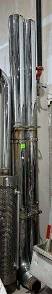 PAIR OF EXHAUST STACKS 133" - Shackelton Auctions Inc.