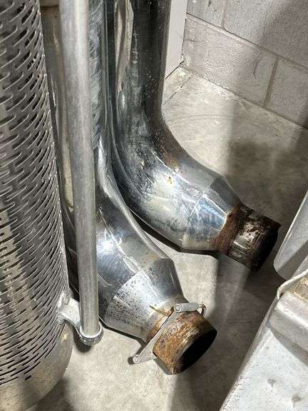 PAIR OF EXHAUST STACKS 133" - Shackelton Auctions Inc.