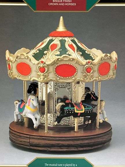 MELODY IN MOTION HAND PAINTED MUSICAL CAROUSEL - Shackelton Auctions Inc.