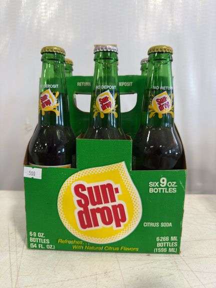 SUNDROP POP BOTTLES WITH CARRIER - Shackelton Auctions Inc.