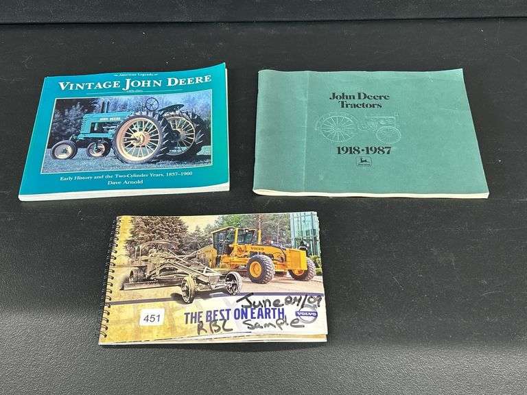 TWO JOHN DEERE BOOKS AND VOLVO BOOKLET - Shackelton Auctions Inc.