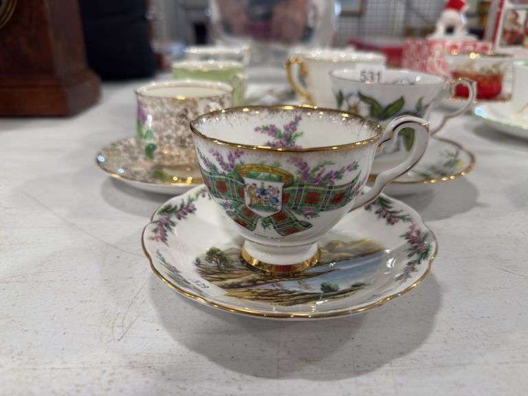 SEVEN TEACUPS WITH SAUCERS - Shackelton Auctions Inc.