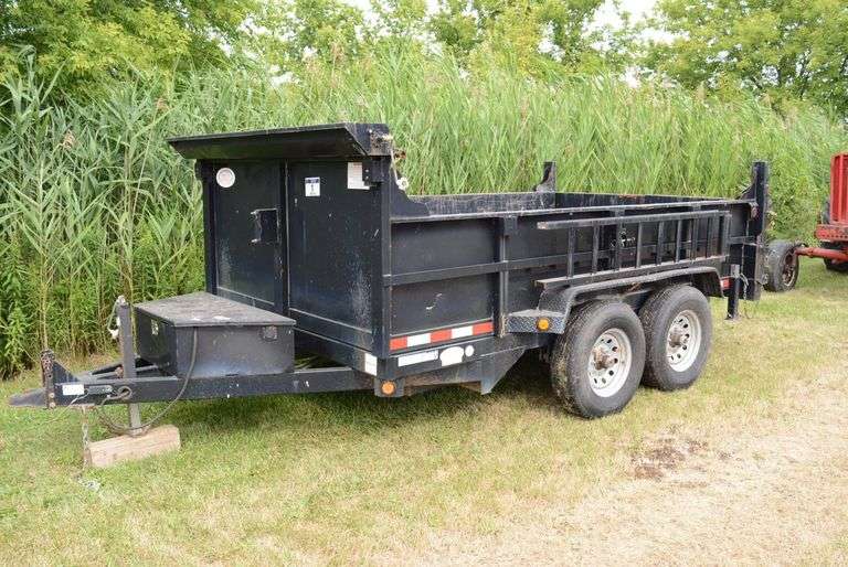 2014 T/A HYDRAULIC STEEL DUMP TRAILER - Shackelton Auctions Inc.