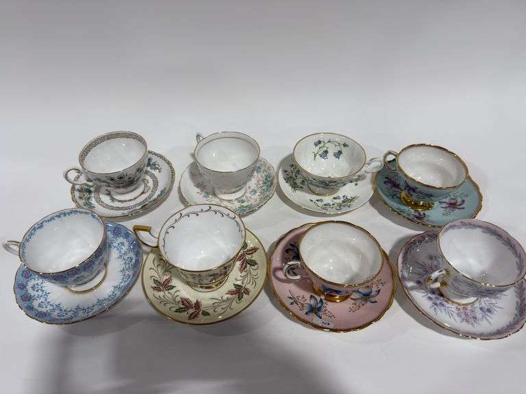 EIGHT TEA CUPS AND SAUCERS - Shackelton Auctions Inc.