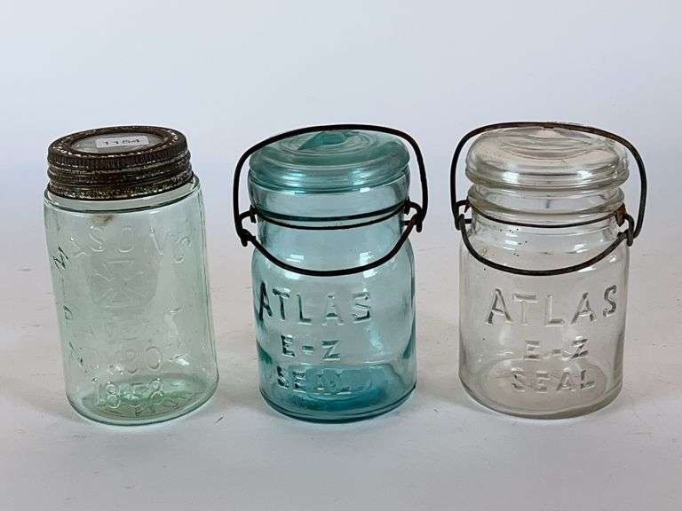 MASONS AND TWO ATLAS PINT FRUIT JARS - Shackelton Auctions Inc.