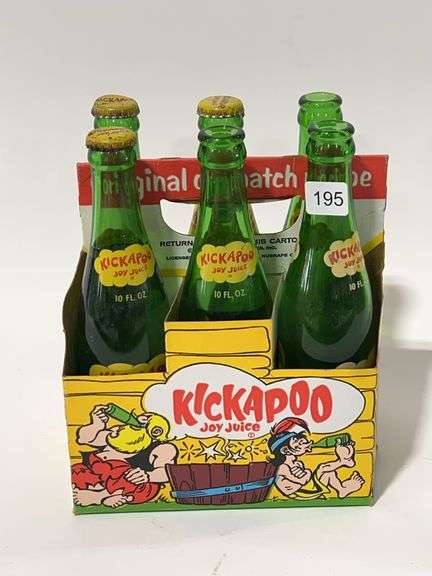 KICKAPOO 10 OZ POP BOTTLES WITH CARRIER - Shackelton Auctions Inc.