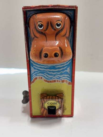 YONE TIN WIND-UP COIN BANK - Shackelton Auctions Inc.