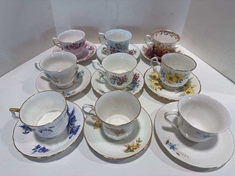 NINE ASSORTED TEA CUPS AND SAUCERS - Shackelton Auctions Inc.