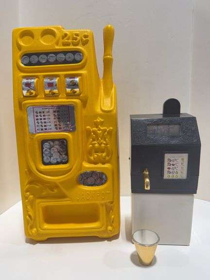 TWO PLASTIC SLOT MACHINE COIN BANKS - Shackelton Auctions Inc.