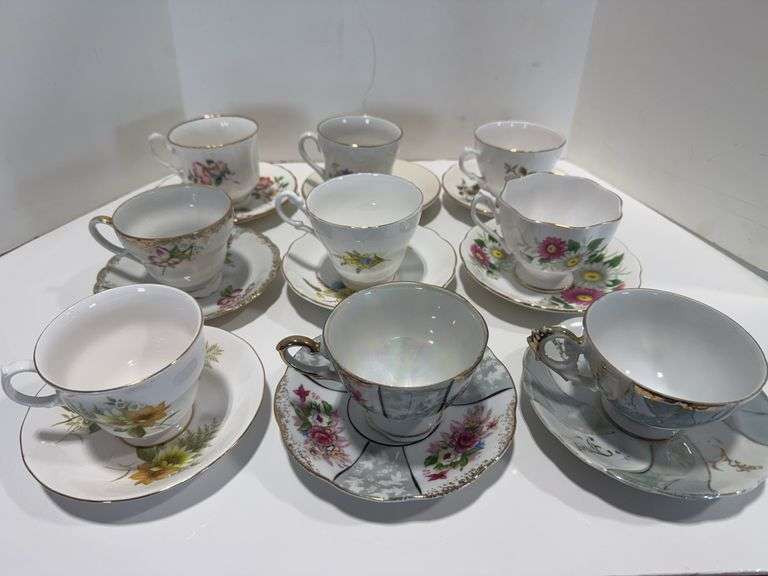 NINE ASSORTED TEA CUPS AND SAUCERS - Shackelton Auctions Inc.