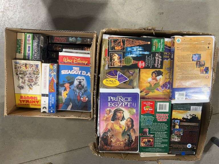TWO BOXES OF ASSORTED VHS TAPES - Shackelton Auctions Inc.