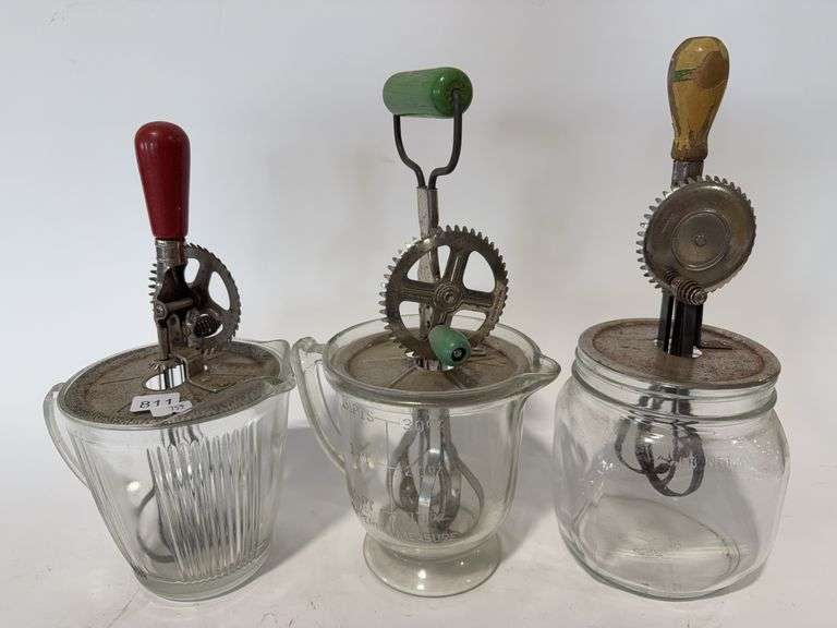 THREE ANTIQUE HAND BEATERS WITH GLASS JARS - Shackelton Auctions Inc.