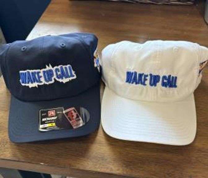 Choice of one white or navy Wake Up Call hat - The Wendt Group Inc.