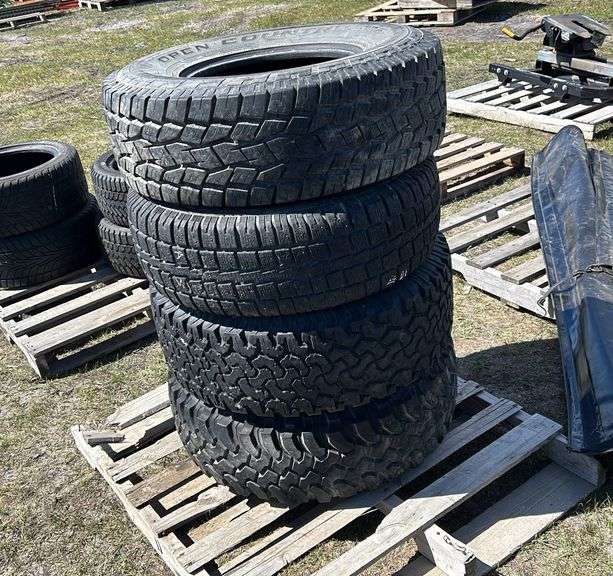 4 assorted Tires, LT 285/75R16, 2 w/ rims - Wild Rose Auction Services