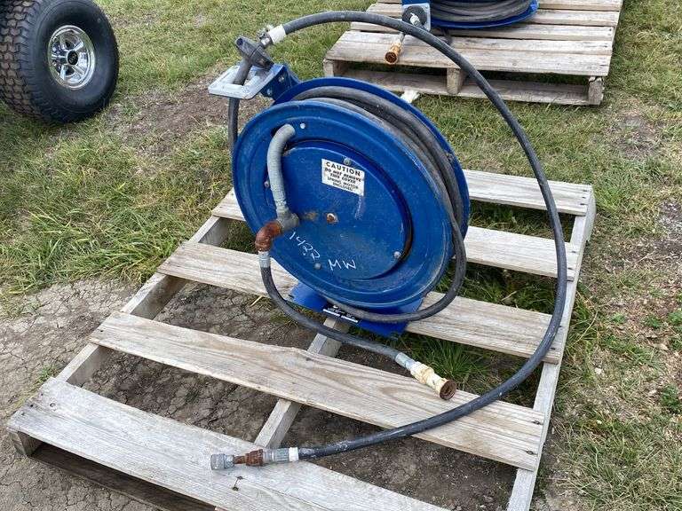 Pallet w/ air hose reel - Wild Rose Auction Services