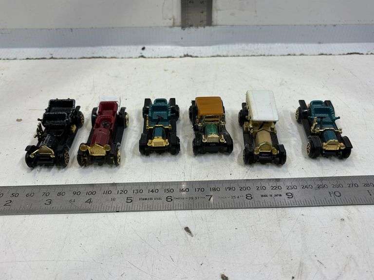 Assorted mini vintage car toys - Wild Rose Auction Services