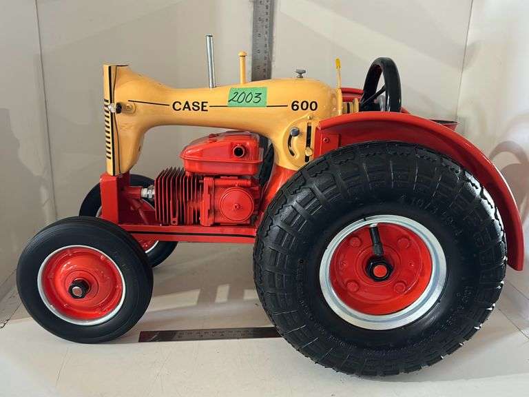 Case 600 Tractor from sewing machine - Wild Rose Auction Services