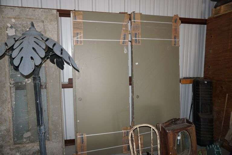 Fire rated metal slab door (approx. 35” x 8’) - World Wide Auction Inc