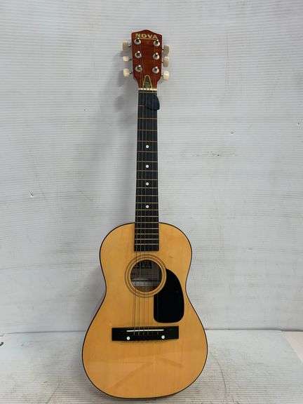 Model 3301 Nova Children's Guitar - YAC Auctions