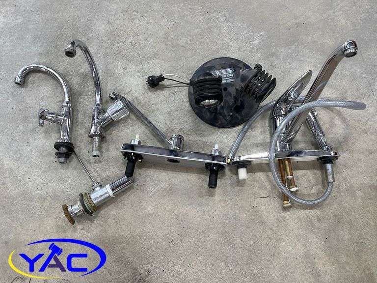 Box Of Faucets and Plumbing Items - YAC Auctions