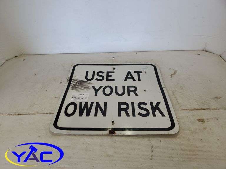 "Use At Your Own Risk" Sign - YAC Auctions