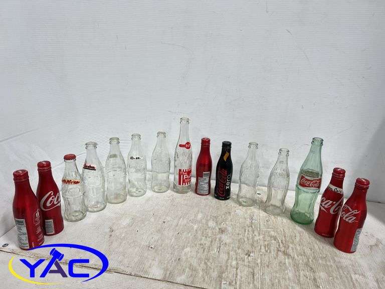 15-Coca Cola Bottles - YAC Auctions