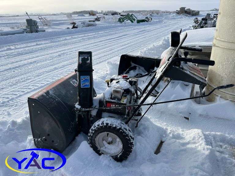 SnowFlite 10.5HPx29" Electric Start Snowblower - YAC Auctions