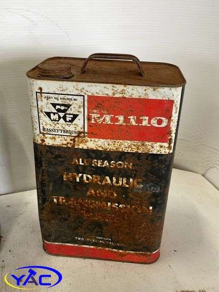 4 - Vintage Oil Containers - YAC Auctions