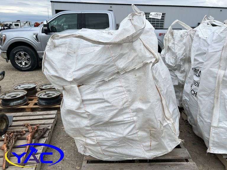 Mini Bulk Bag Of Seasoned Spruce/ Pine Mix Fire Wood - YAC Auctions