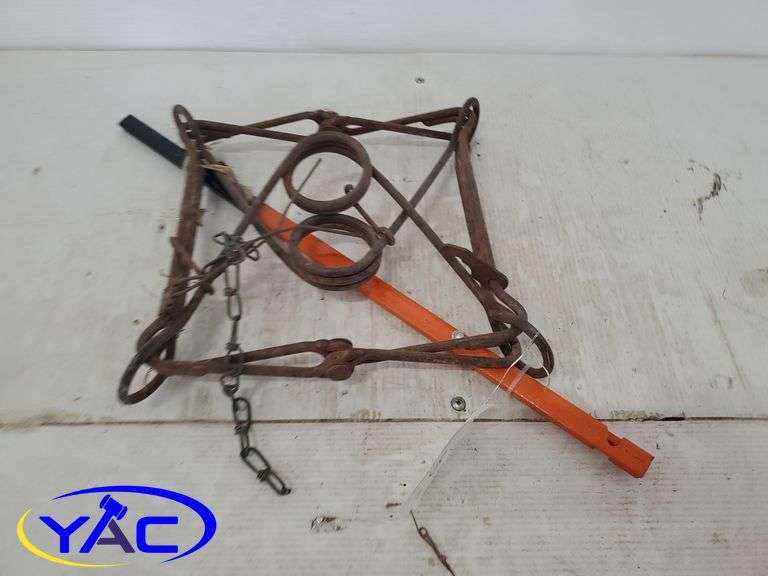 #330 Conibear Trap & Setter - YAC Auctions