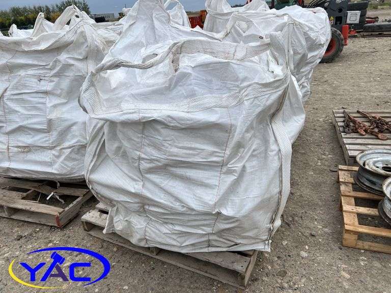 Mini Bulk Bag Of Seasoned Spruce/ Pine Mix Fire Wood - YAC Auctions