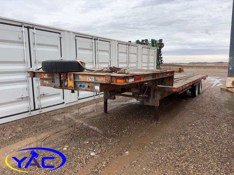 CUSTOM BUILT ROLL BACK TRAILER - YAC Auctions