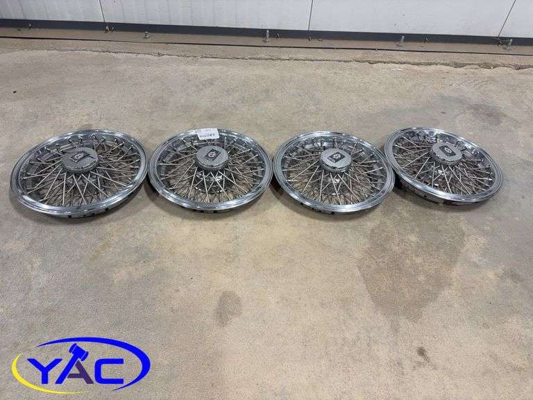 4- 15" Wire Wheel Hub Caps - YAC Auctions