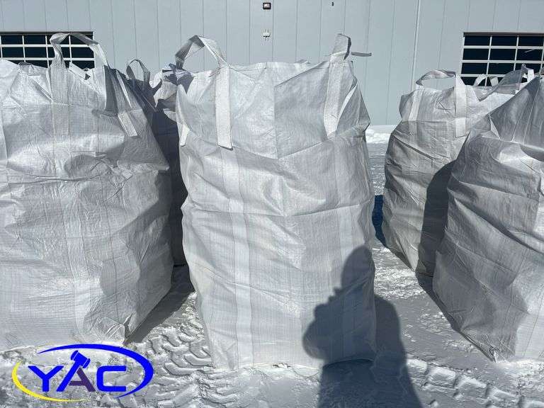 Mini Bulk Bag Of Split Spruce Firewood - YAC Auctions